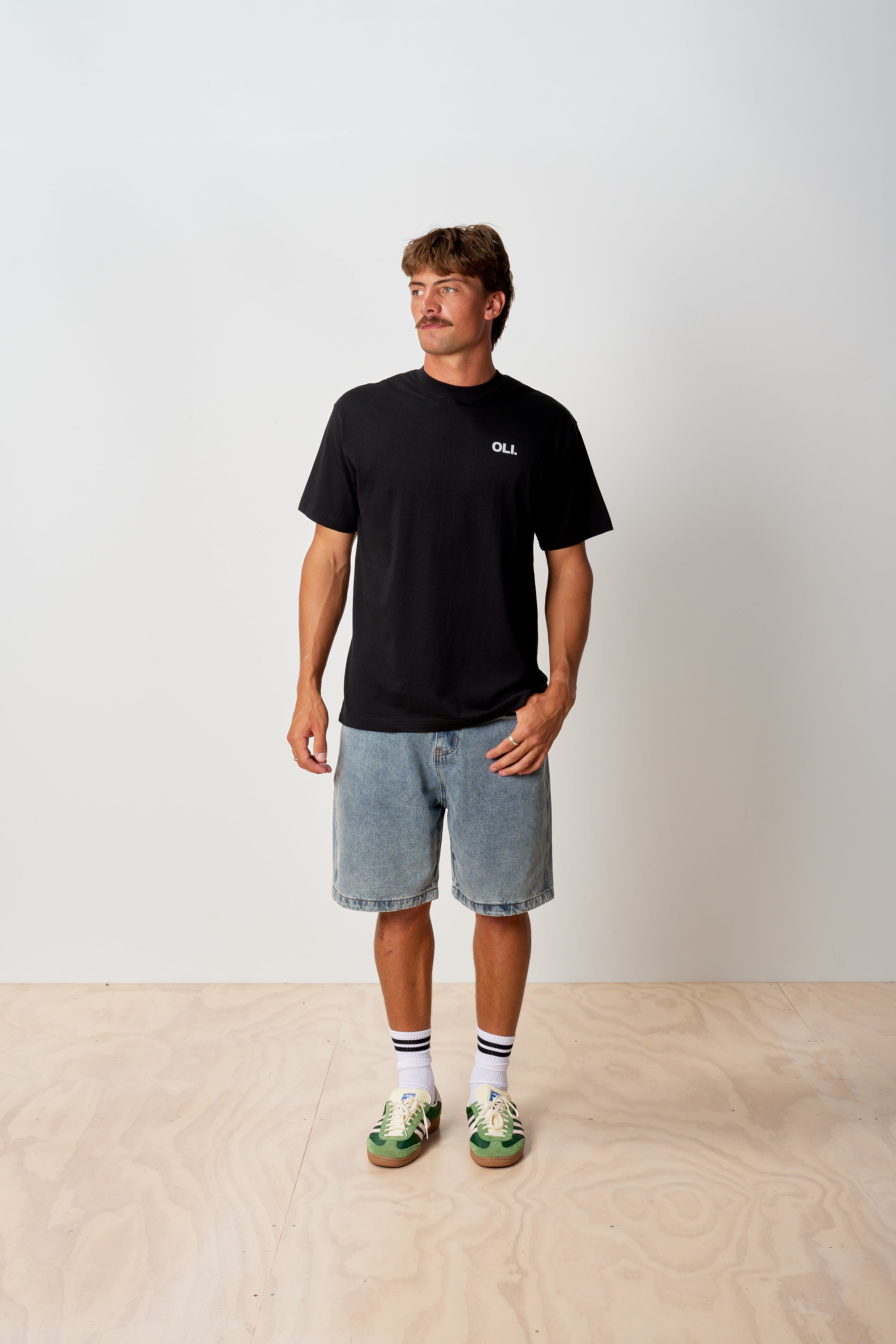 Emblem Back Print T - Black – Oli.
